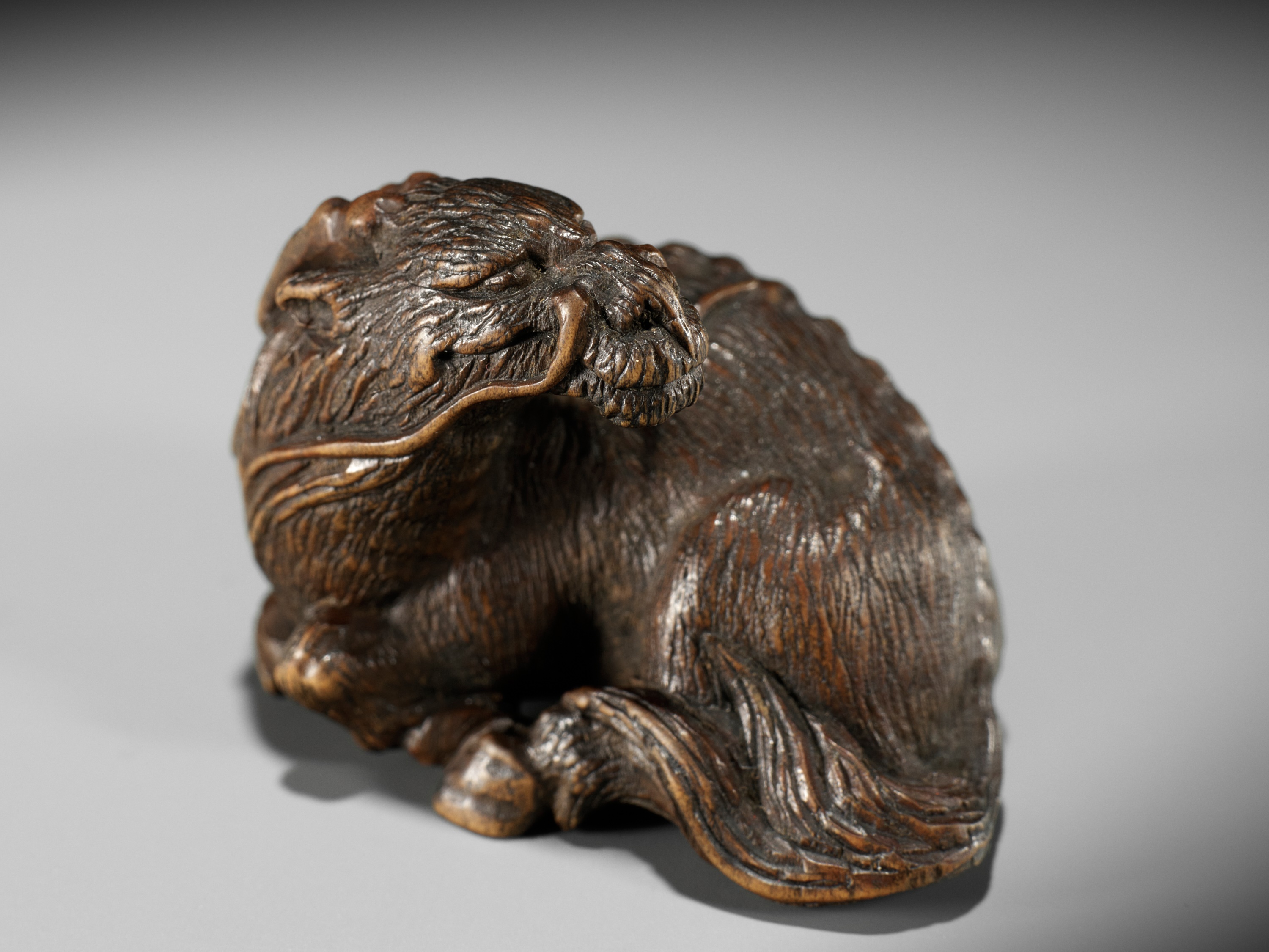 Lot 72 - ICHIYU: A SUPERB NAGOYA SCHOOL WOOD NETSUKE