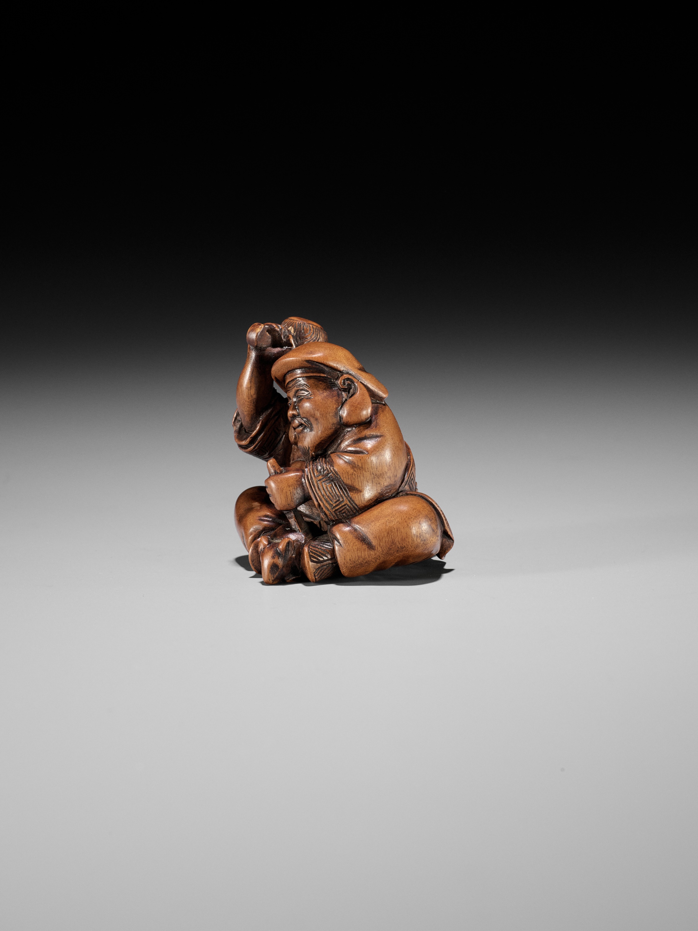 Lot 124 - MASANAO: A RARE WOOD NETSUKE OF DAIKOKU