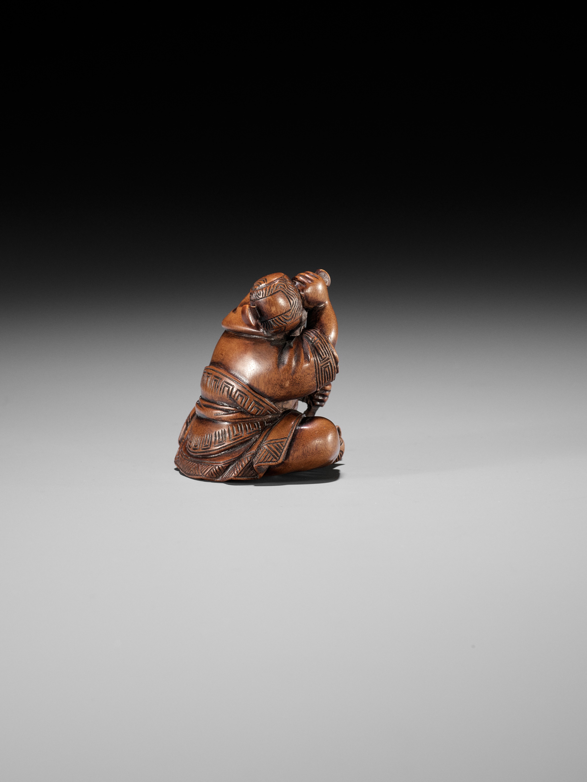 Lot 124 - MASANAO: A RARE WOOD NETSUKE OF DAIKOKU