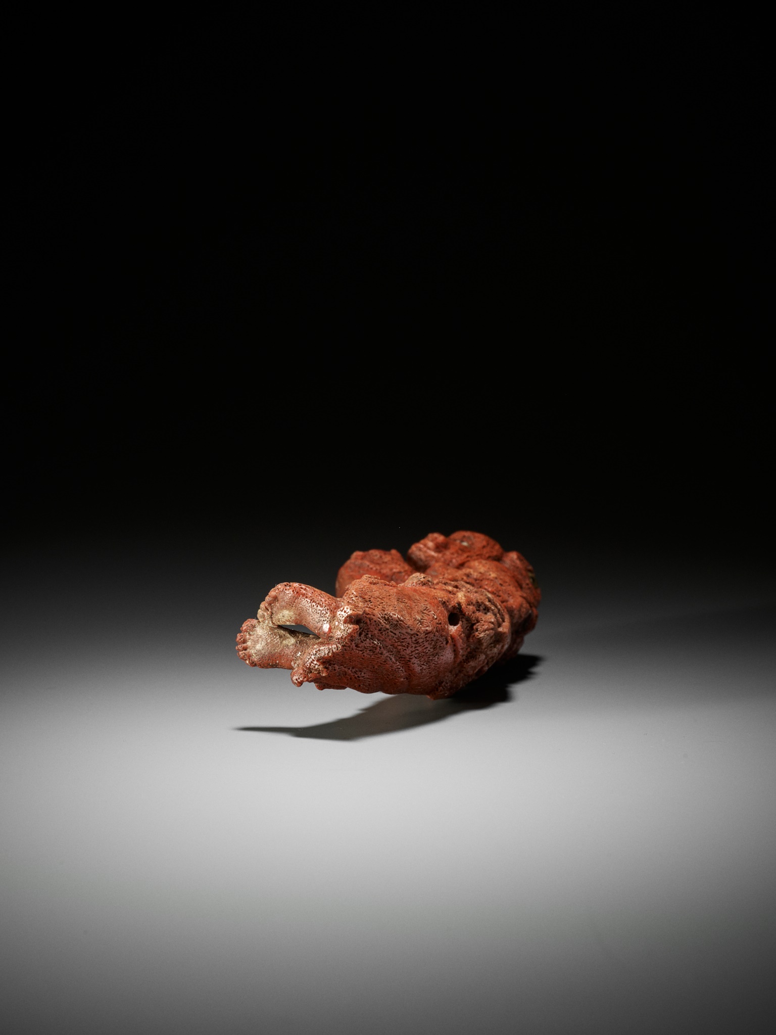 Lot 300 - AN EXCEPTIONALLY RARE AND LARGE SOLID CORAL