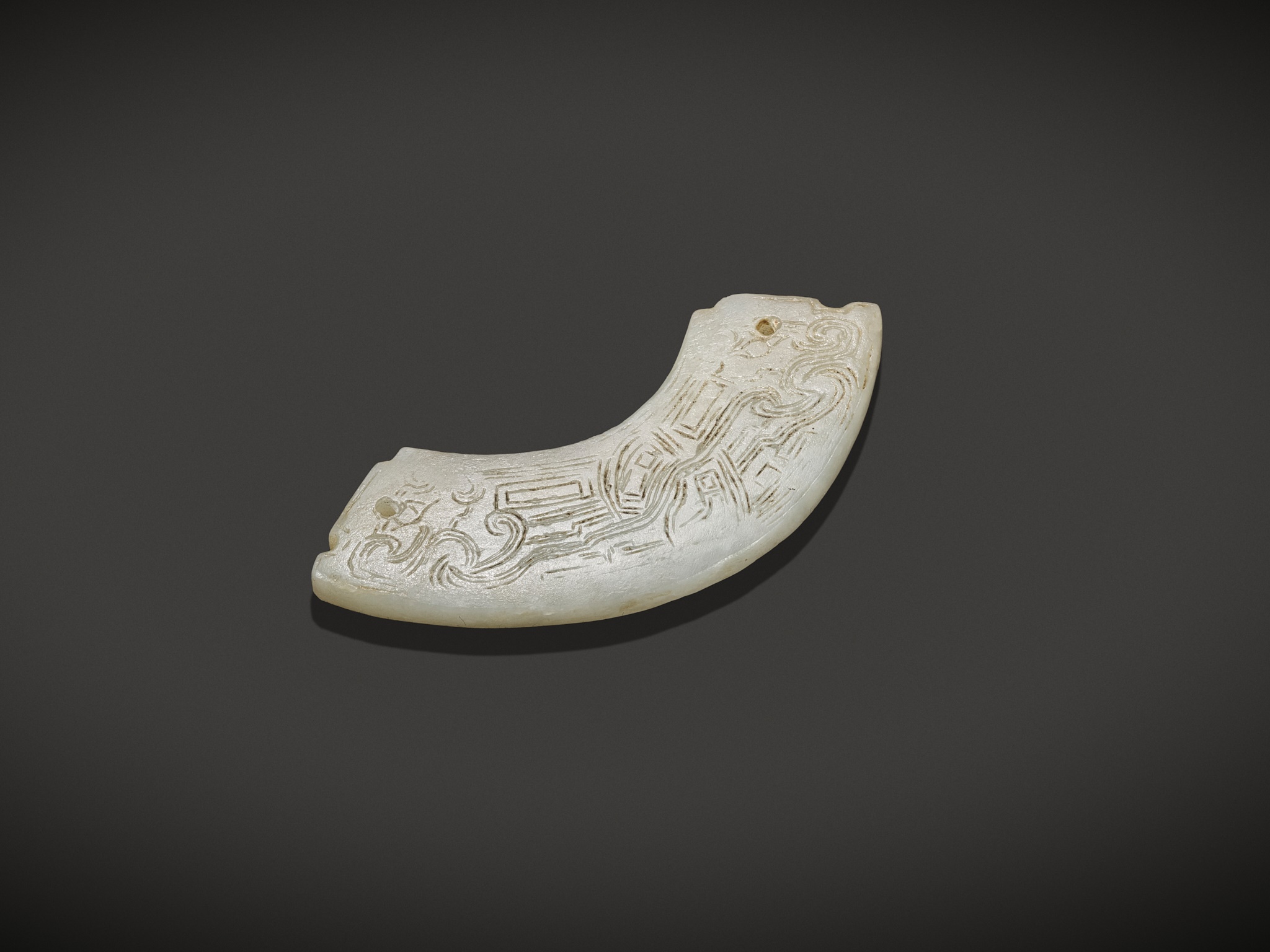 Lot 59 - A JADE ‘DRAGON’ PENDANT, HUANG, WESTERN ZHOU