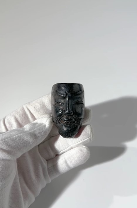 Lot 249 - OKATOMO: A VERY RARE EBONY WOOD MASK NETSUKE