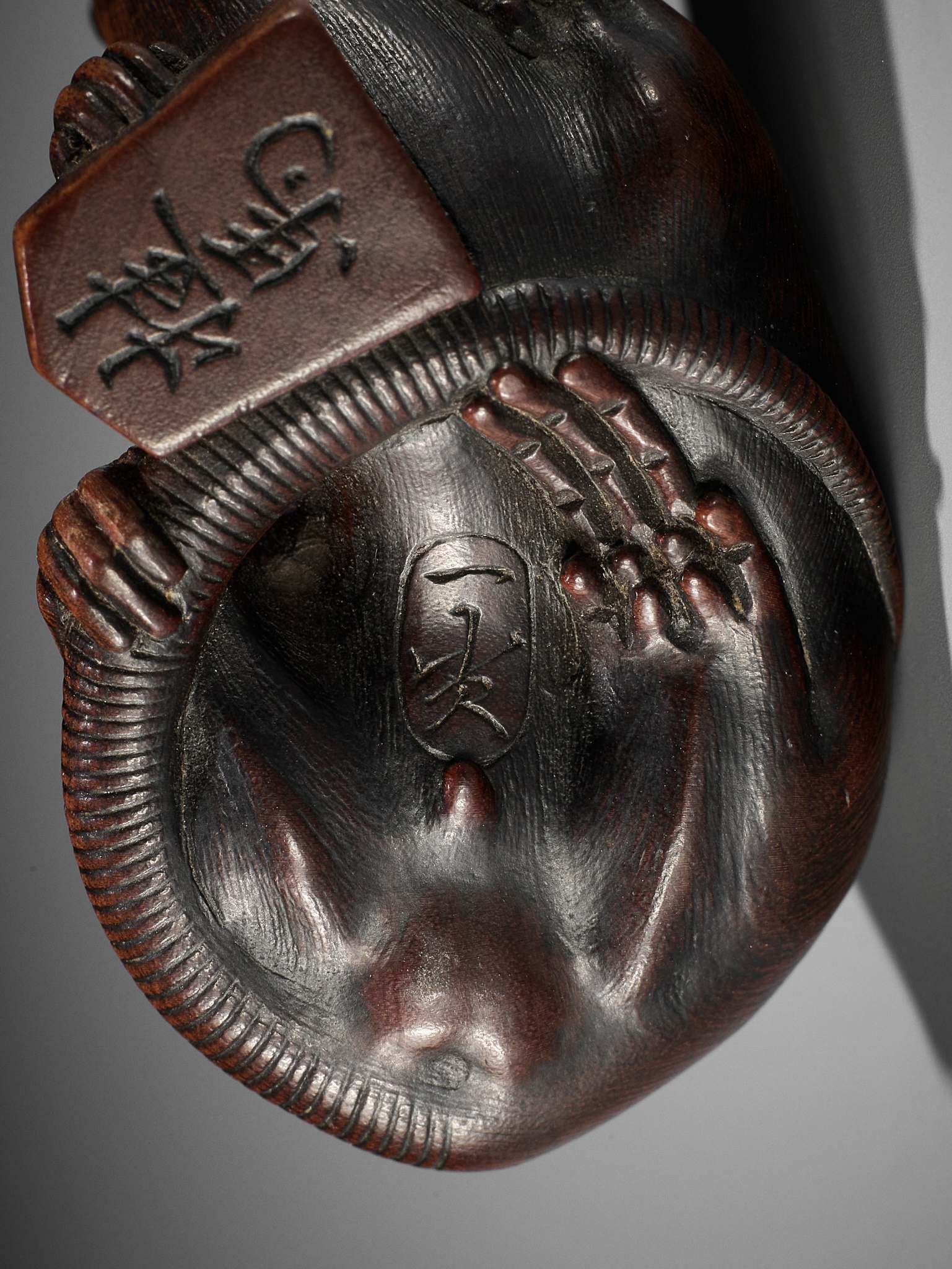 Lot 86 - IKKAN: A FINE WOOD NETSUKE OF A RAT WITH A