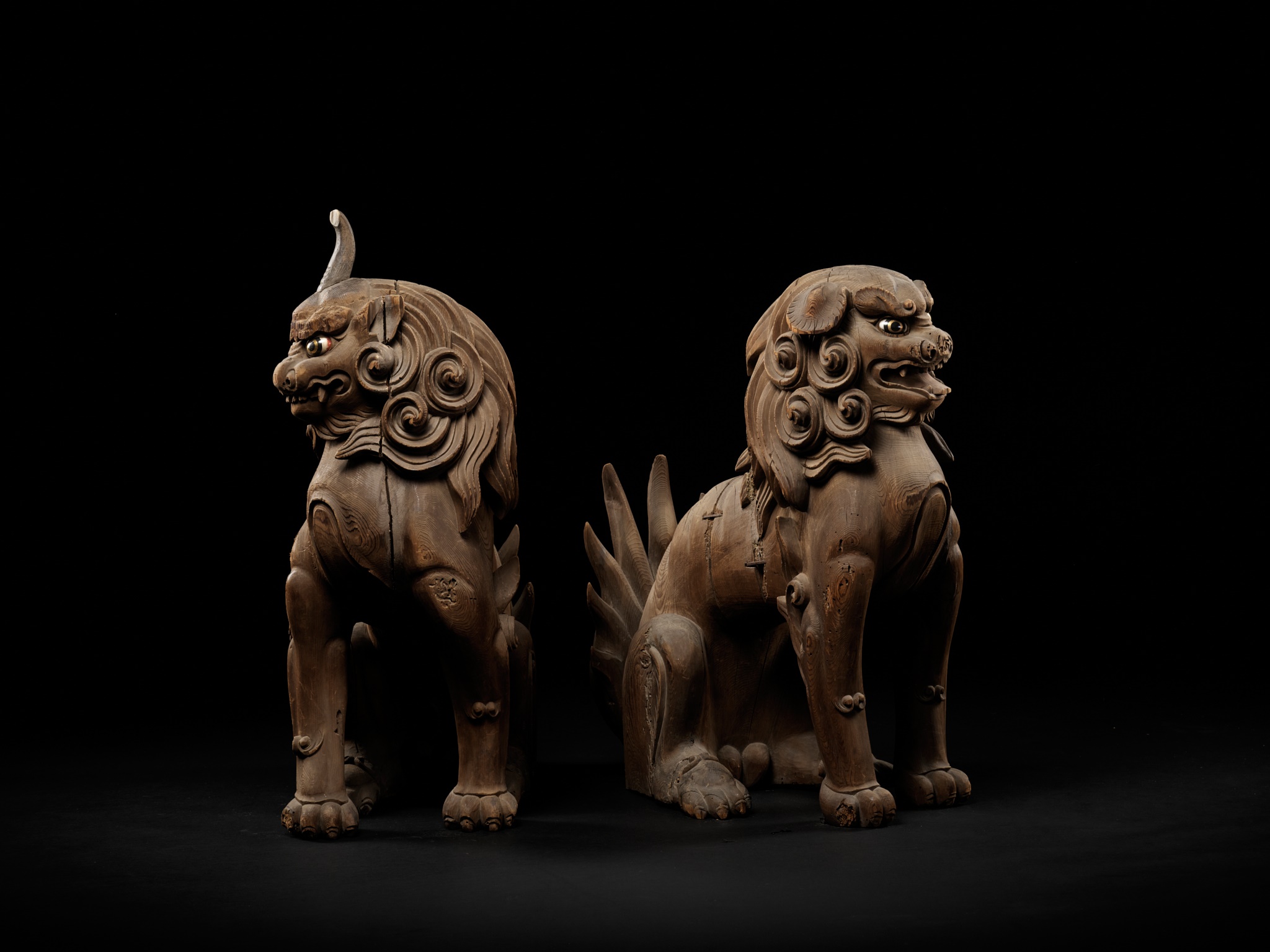 Lot 46 - A PAIR OF WOOD KOMAINU (KOREAN GUARDIAN DOGS),