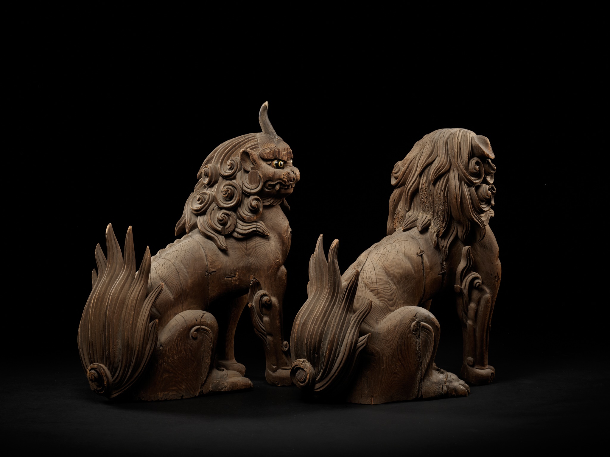 Lot 46 - A PAIR OF WOOD KOMAINU (KOREAN GUARDIAN DOGS),