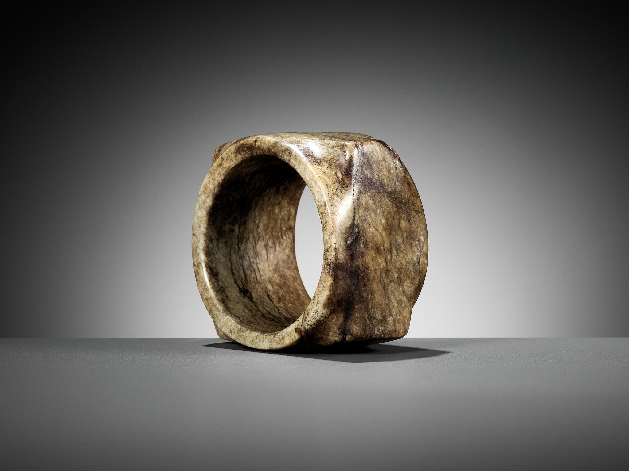 Lot 42 - A MOTTLED JADE CONG, LATE NEOLITHIC TO SHANG