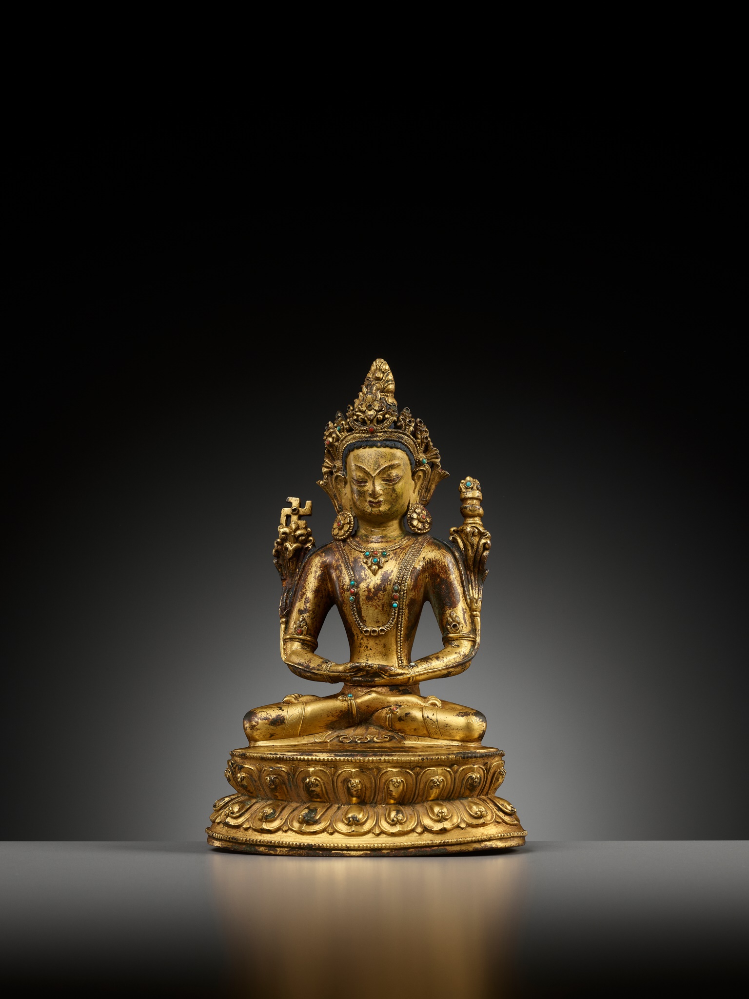 Lot 10 - A GILT BRONZE FIGURE OF TONPA SHENRAP
