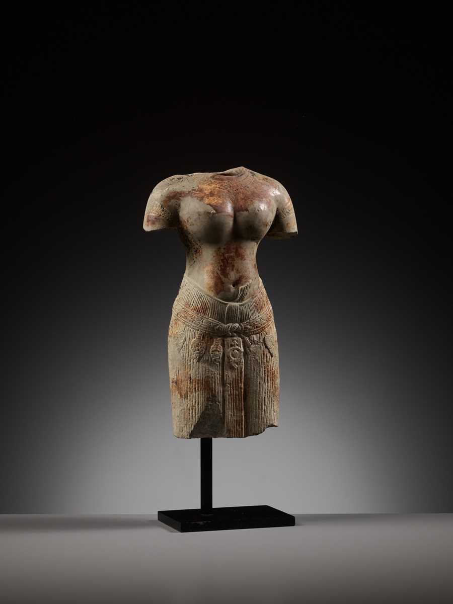 Lot 271 - A SANDSTONE TORSO OF A FEMALE DEITY, ANGKOR