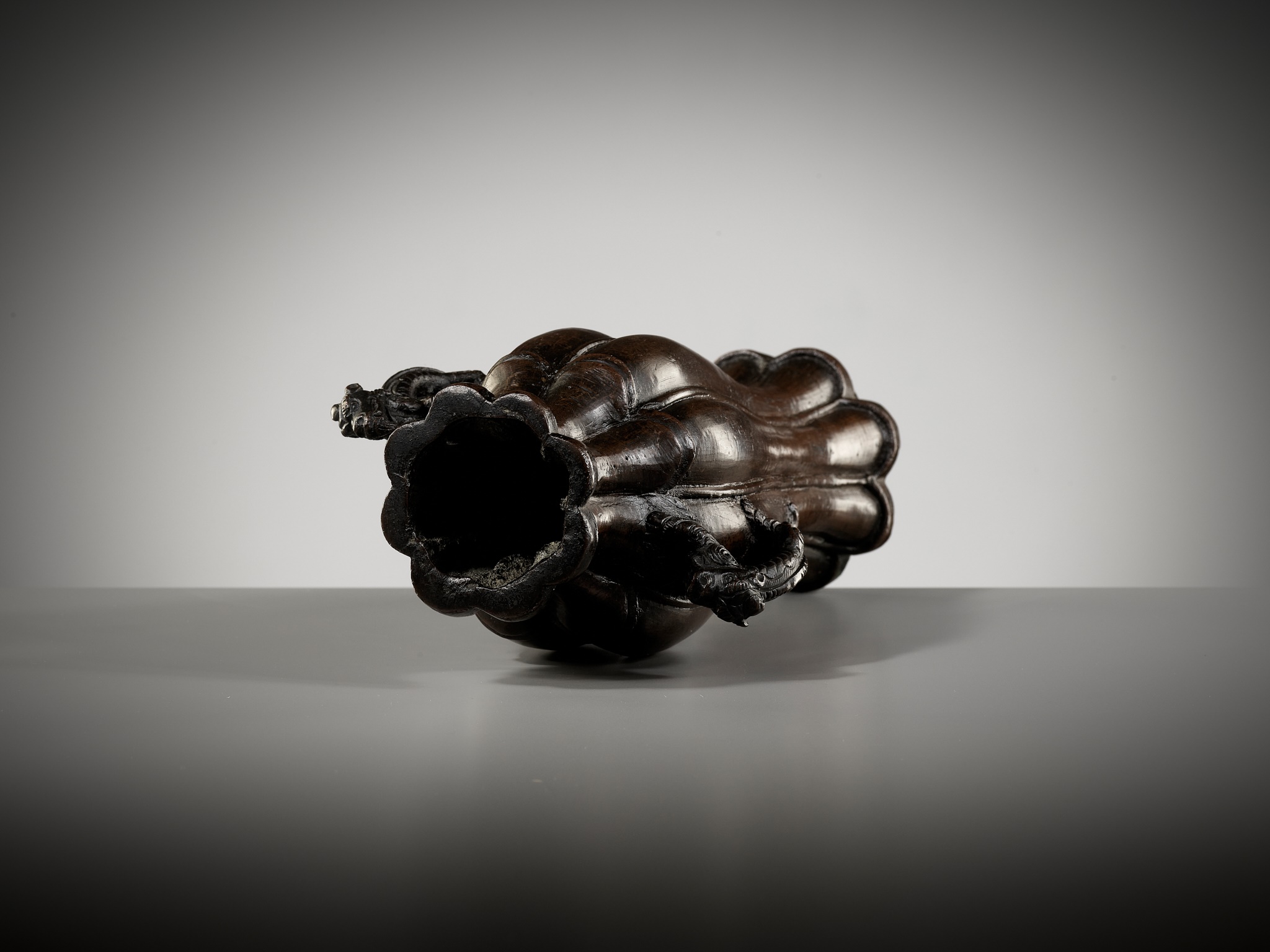 Lot 629 - A LOBED BRONZE ‘CHILONG’ VASE, CHINA, 17TH