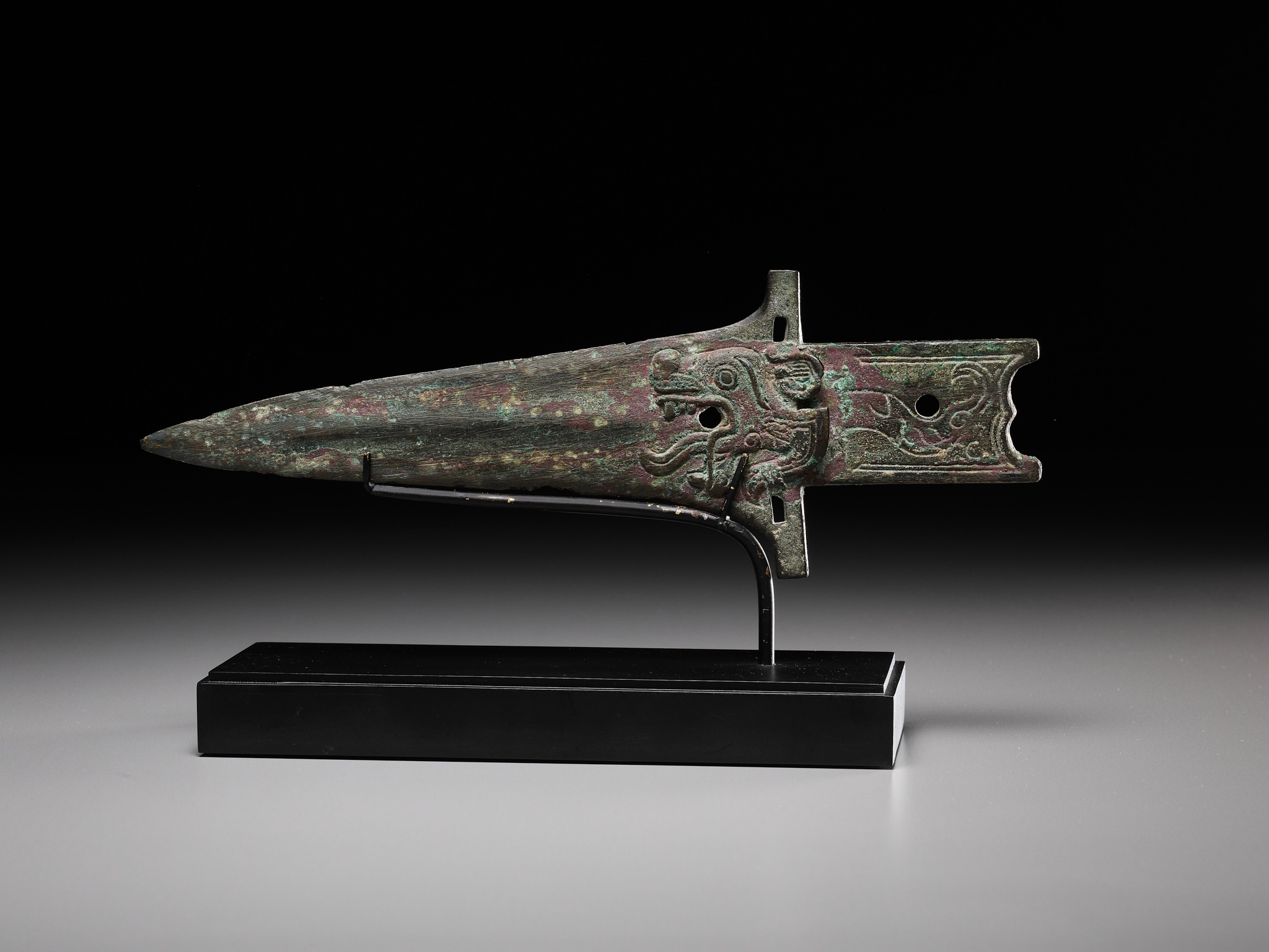 Lot 299 - A BRONZE ‘TIGER’ HALBERD BLADE, ZHONGHU GE,
