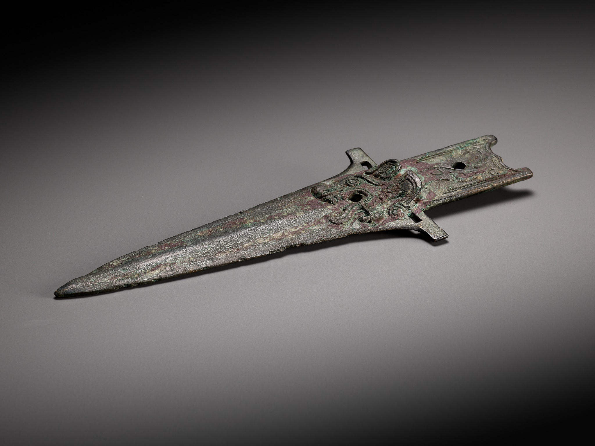 Lot 299 - A BRONZE ‘TIGER’ HALBERD BLADE, ZHONGHU GE,