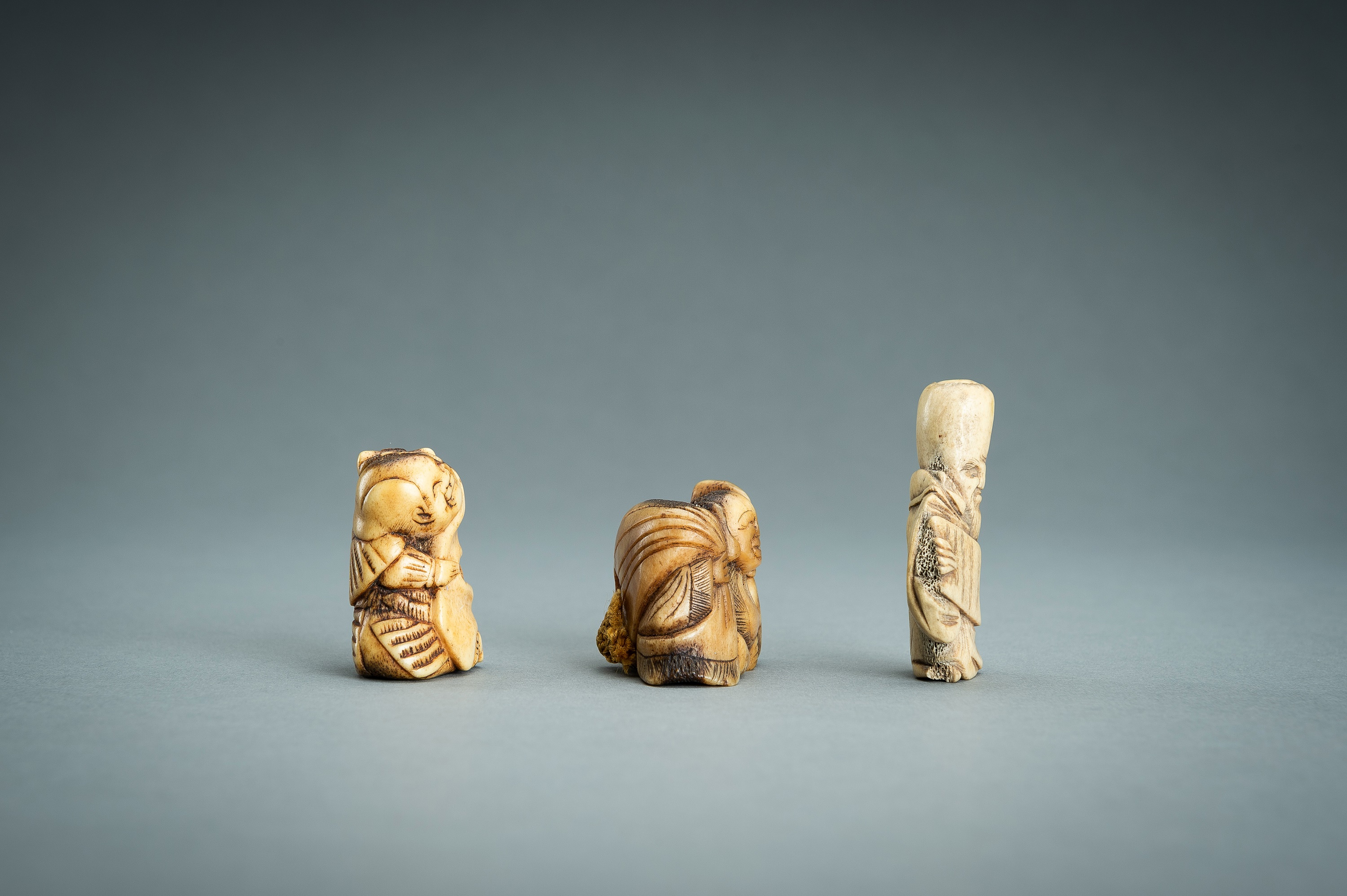 Lot 770 - A LOT WITH SIX STAG ANTLER NETSUKE, EDO