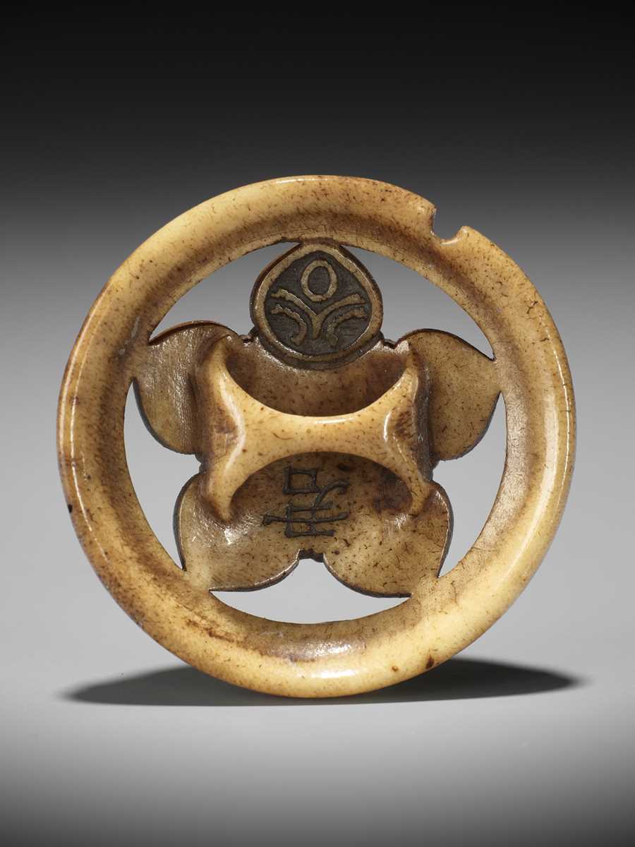 Lot 298 - KOKUSAI: A FINE ANTLER RYUSA MANJU NETSUKE