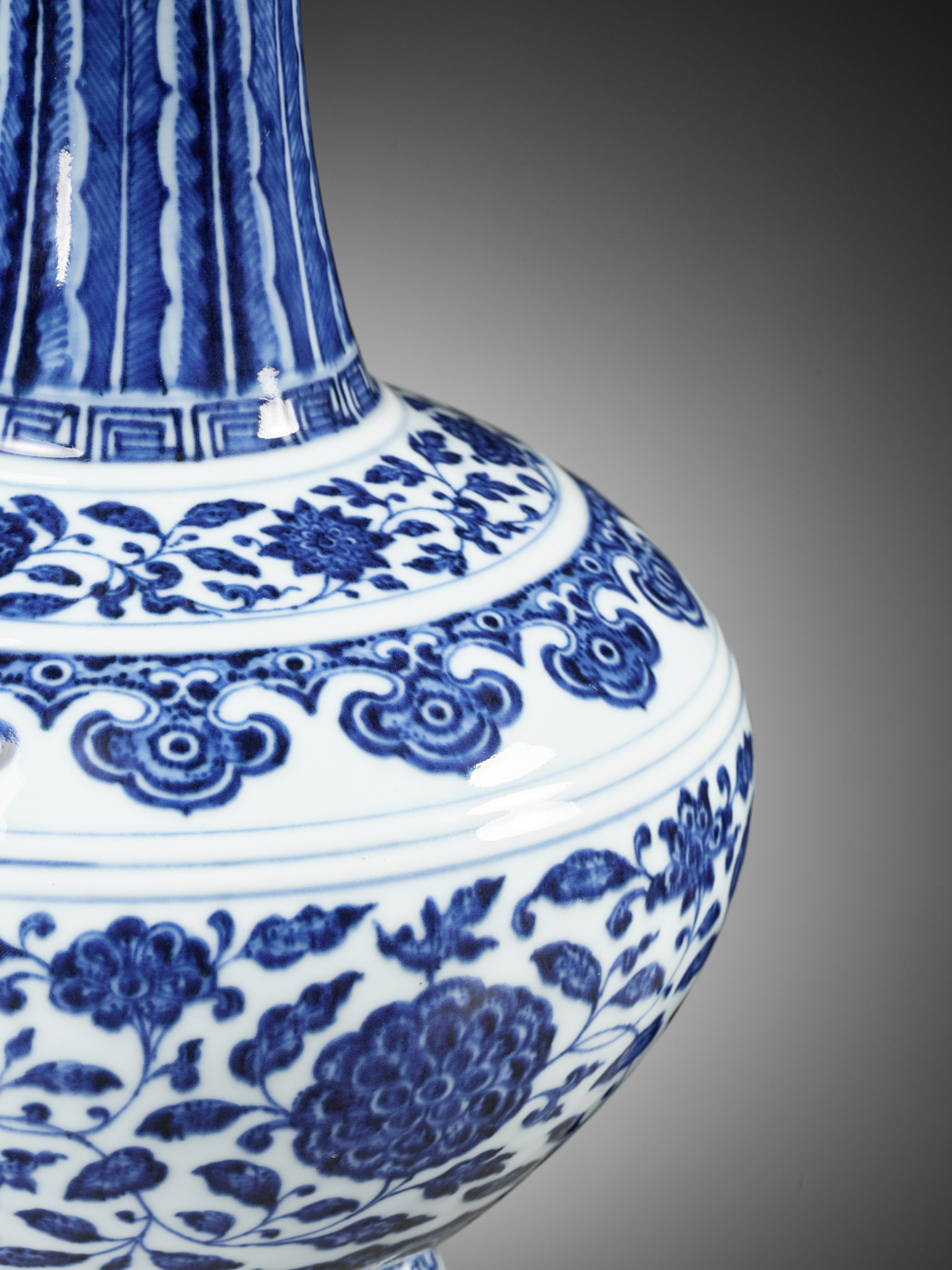 Lot 212 - A BLUE AND WHITE ‘MING-STYLE’ BOTTLE VASE,