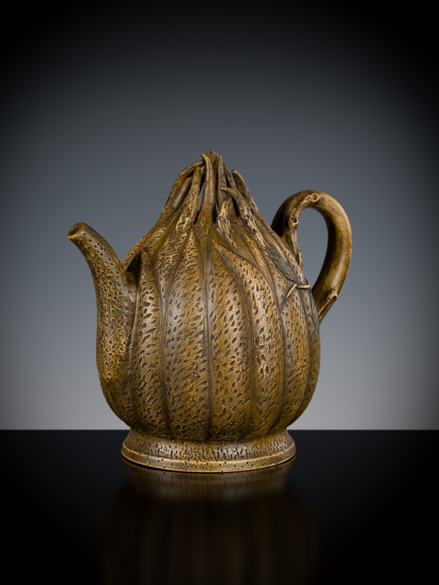 Lot 296 - A YIXING ‘BUDDHA HAND’ CADOGAN TEAPOT, CHINA,