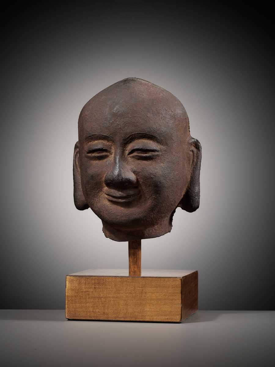 Lot 647 - A CAST-IRON HEAD OF A LUOHAN, SONG DYNASTY