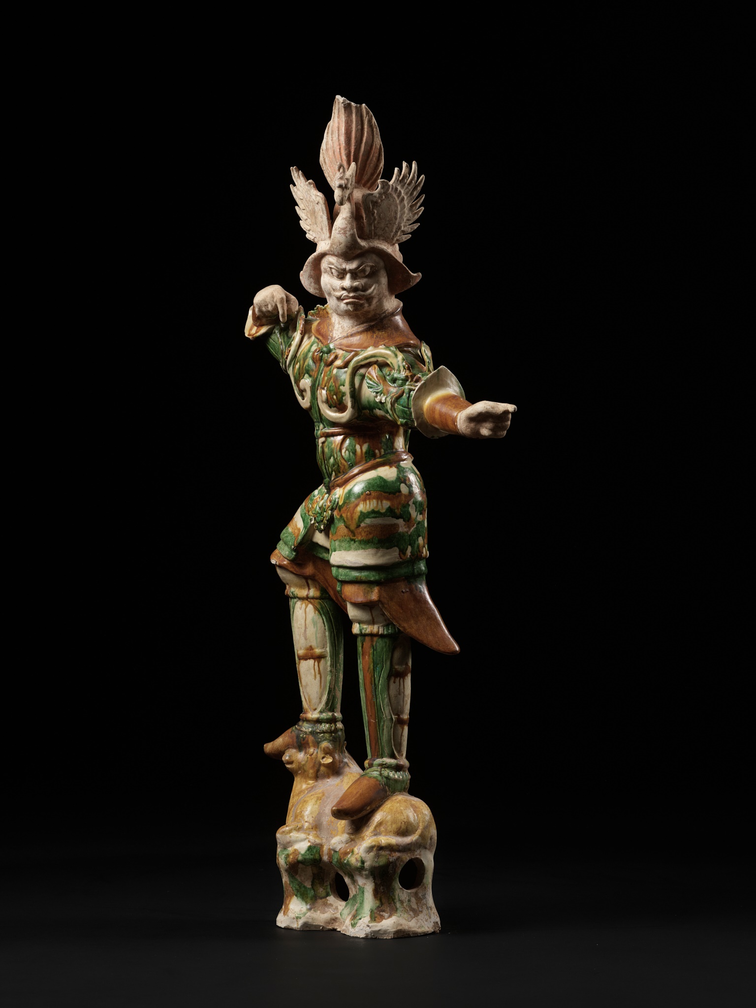 Lot 68 - A LARGE SANCAI-GLAZED ‘ARCHER’ GUARDIAN