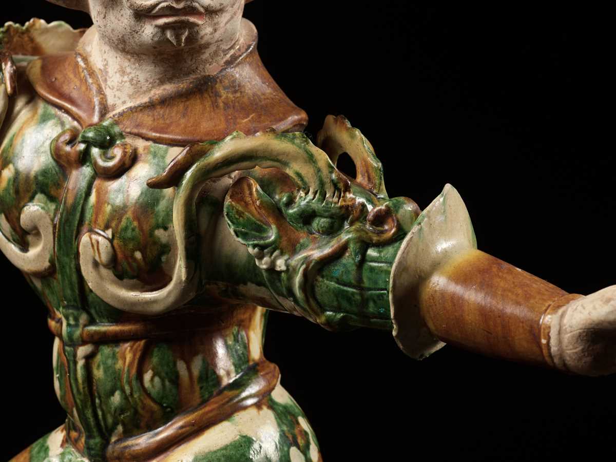 Lot 68 - A LARGE SANCAI-GLAZED ‘ARCHER’ GUARDIAN