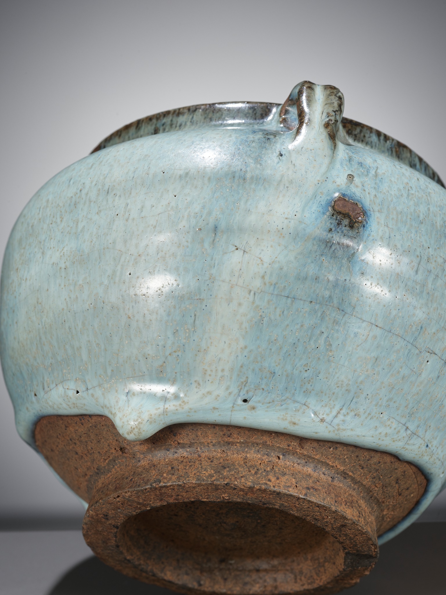 Lot 456 - A JUN-GLAZED TWIN-HANDLED JAR, JIN DYNASTY