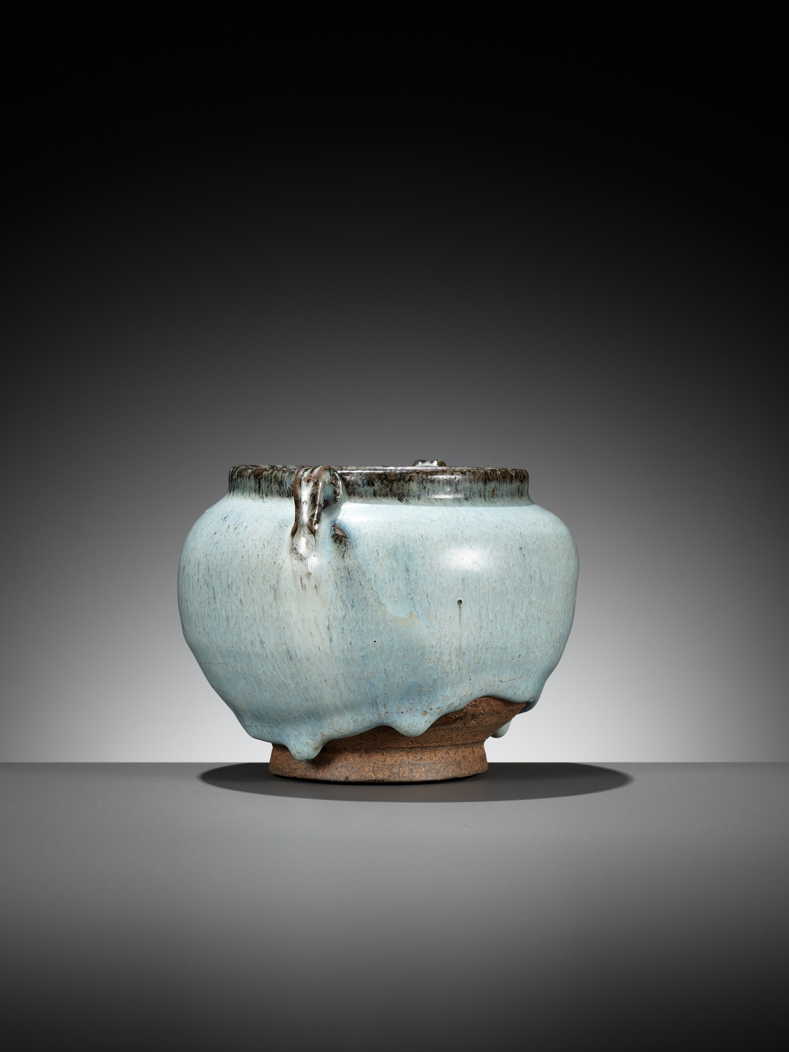 Lot 456 - A JUN-GLAZED TWIN-HANDLED JAR, JIN DYNASTY