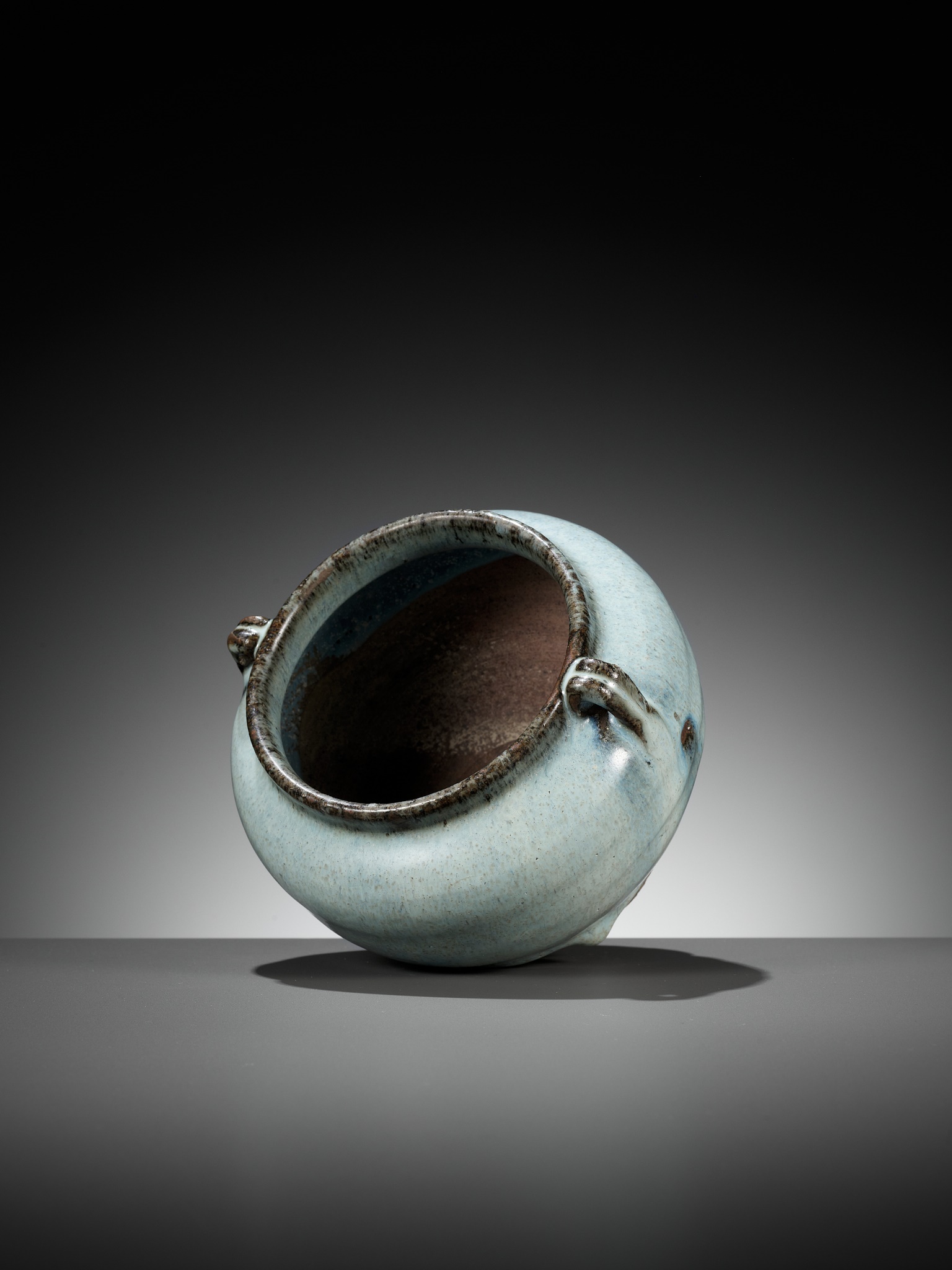 Lot 456 - A JUN-GLAZED TWIN-HANDLED JAR, JIN DYNASTY