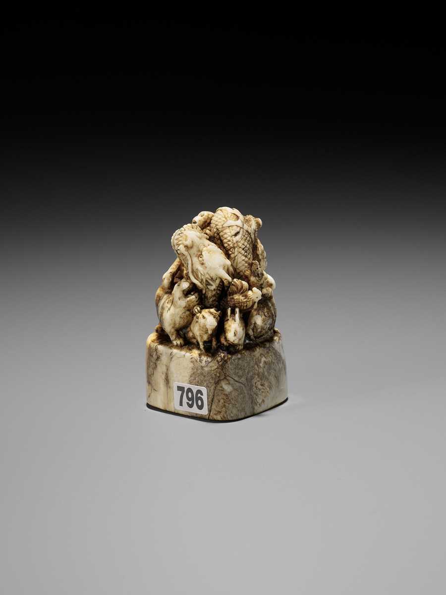 Lot 242 - CHOKUSAI: A RARE WALRUS TUSK SEAL (INGYO)