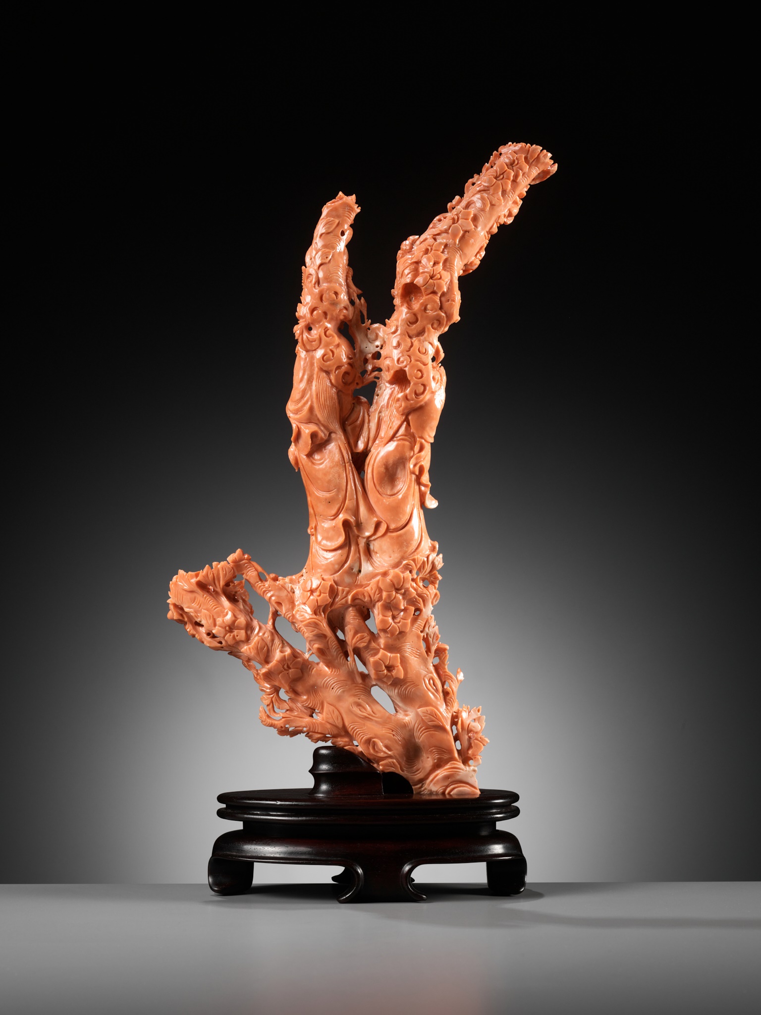 Lot 280 - A LARGE CORAL CARVING OF TWO MEIREN