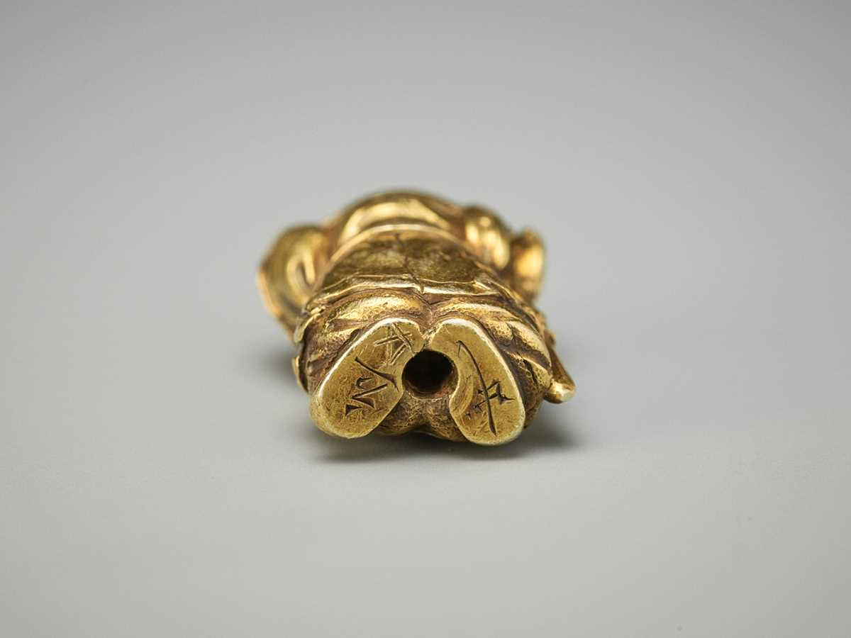 Lot 357 - RYUMIN: A VERY RARE SOLID GOLD OJIME OF