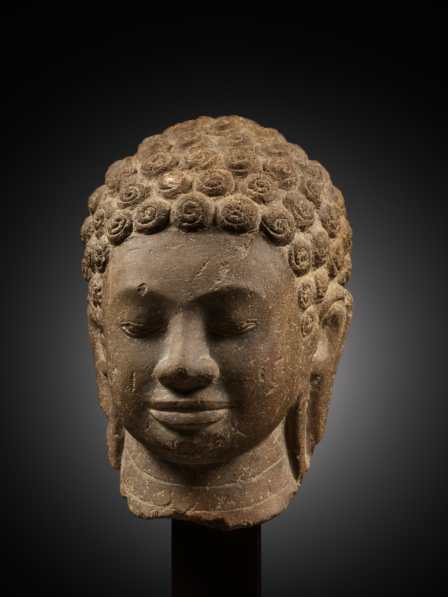 Lot 166 - A STONE HEAD OF BUDDHA, MON DVARAVATI PERIOD,