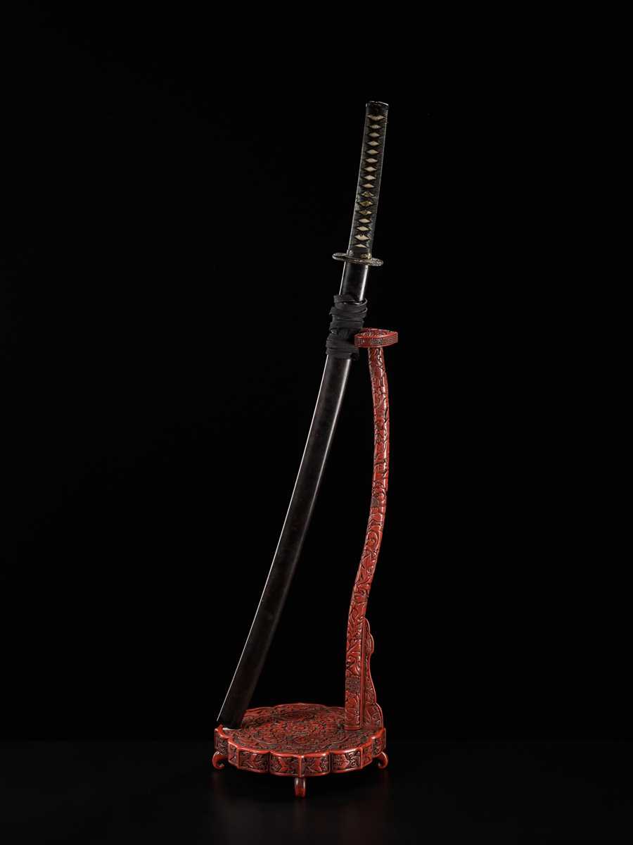 Lot 63 - A FINE TSUISHU (CARVED RED LACQUER) TACHI