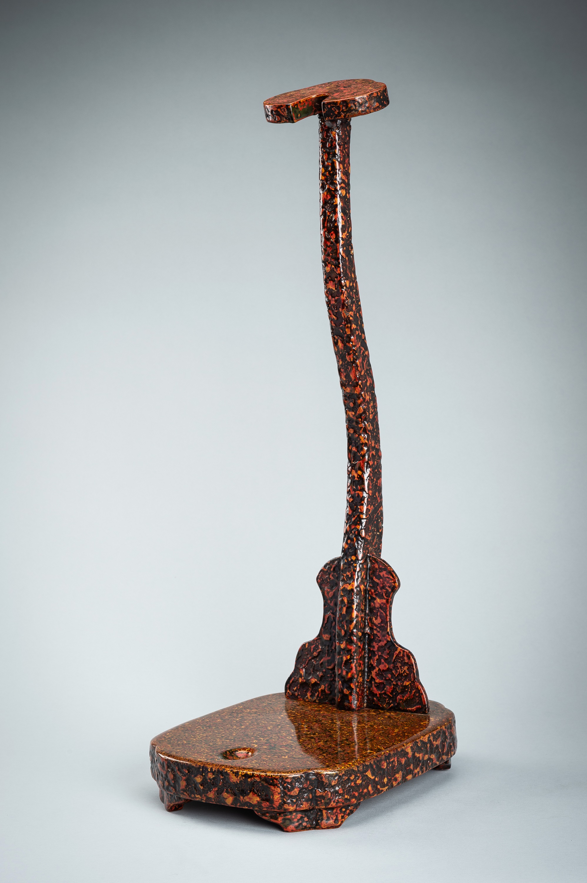 Lot 41 - A TSUGARU LACQUER TACHI KAKE (STAND FOR A
