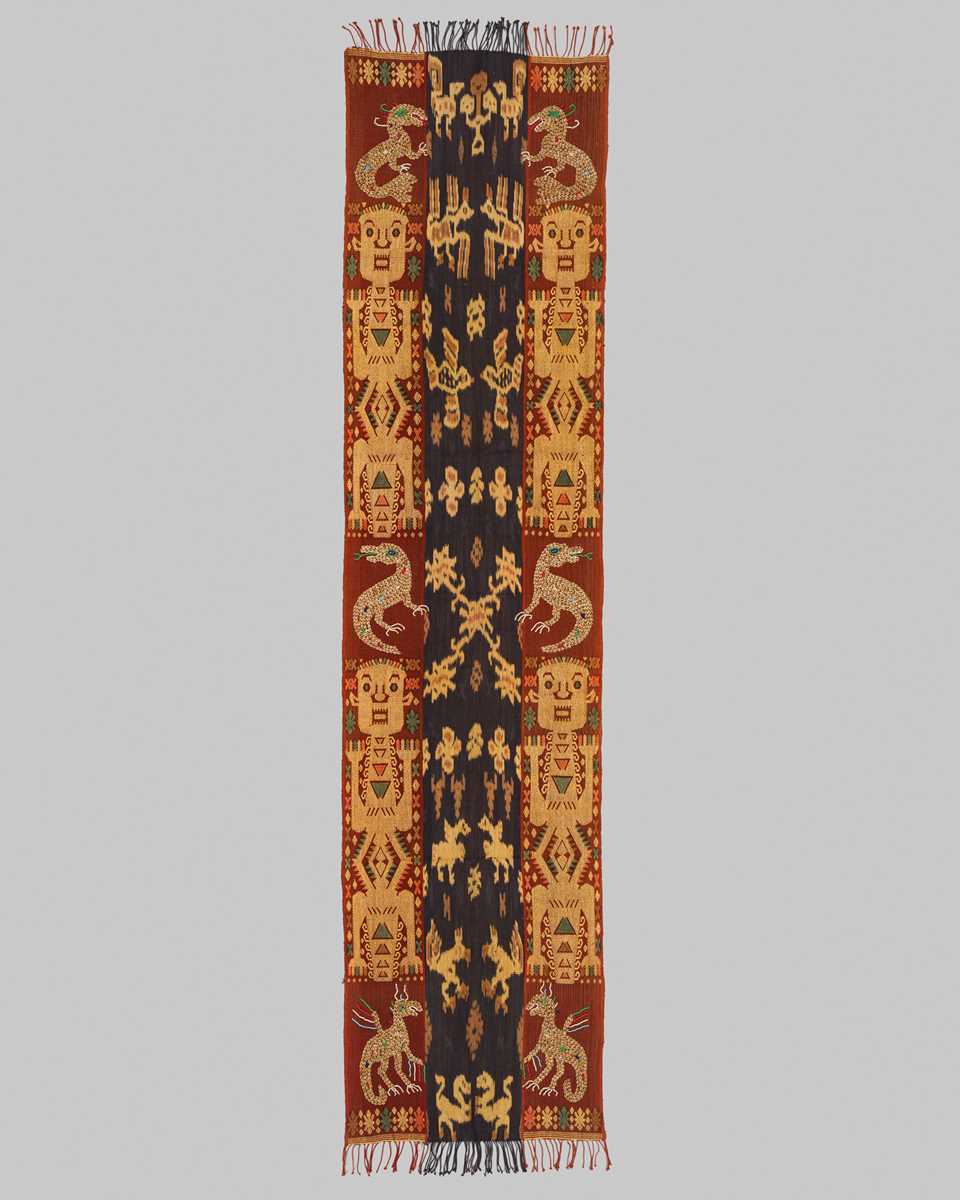 Lot 1569 - A SUMBA IKAT PANEL WITH SHELL DESIGNS,