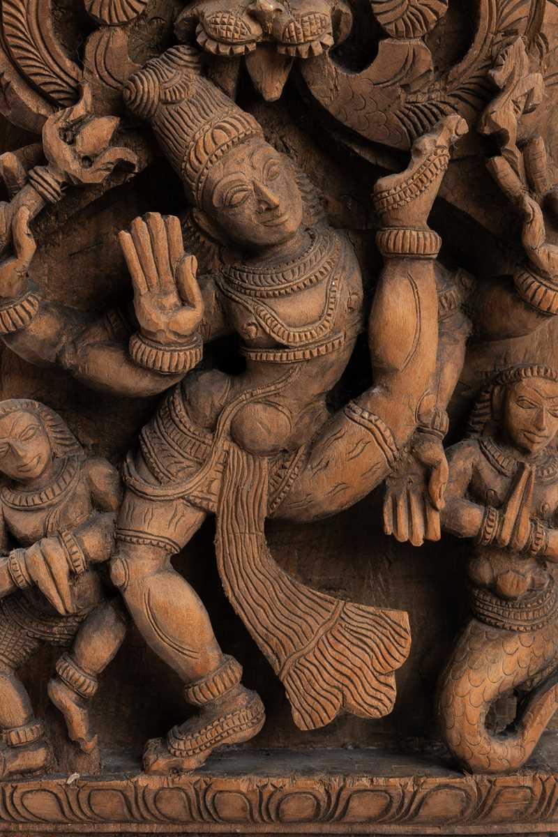 Lot 1635 - AN INDIAN WOOD RELIEF OF DANCING VISHNU