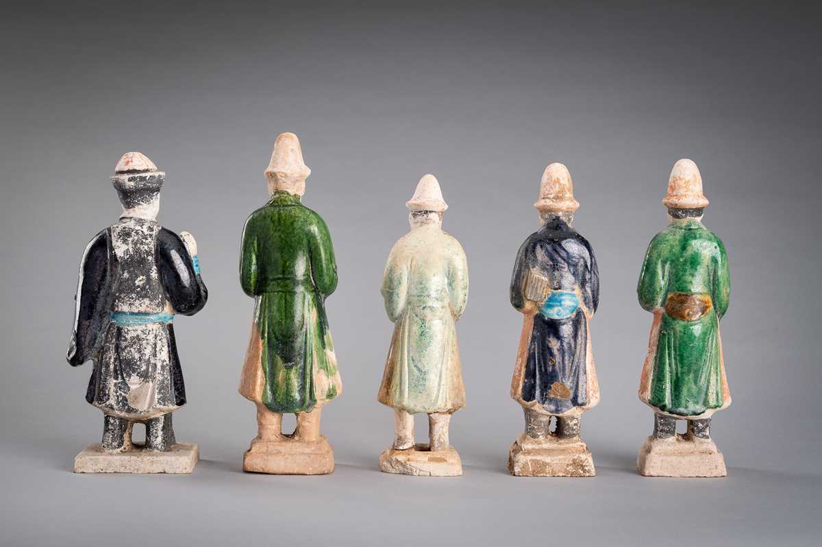 Lot 1235 - A GROUP OF FIVE POTTERY FIGURES, MING