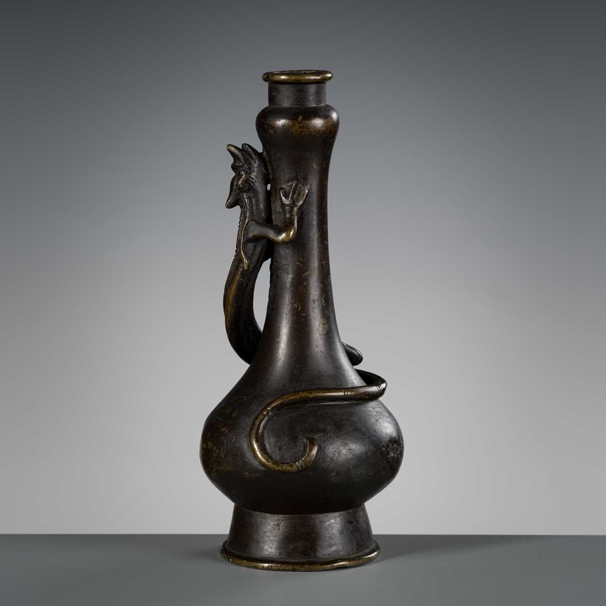 Lot 332 - A BRONZE ‘CHILONG’ VASE, LATE MING TO EARLY