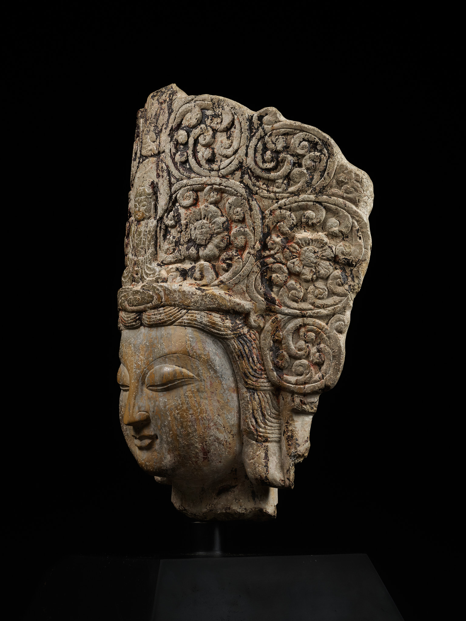Lot 43 - A RARE AND MASSIVE CARVED LIMESTONE HEAD OF