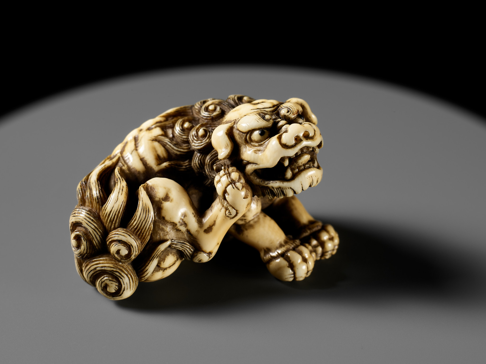 Lot 50 - TOMOTADA: A SUPERB IVORY NETSUKE OF A