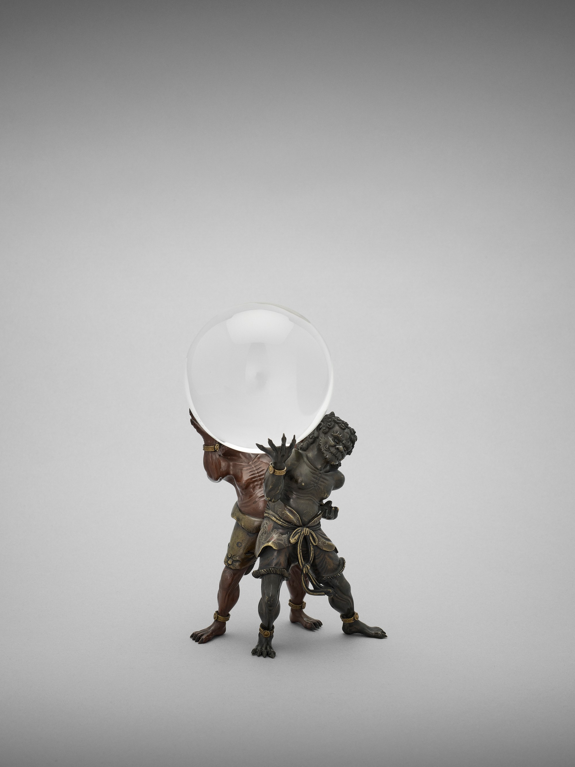 Lot 26 - AN IMPRESSIVE BRONZE OF TWO ONI HOLDING A