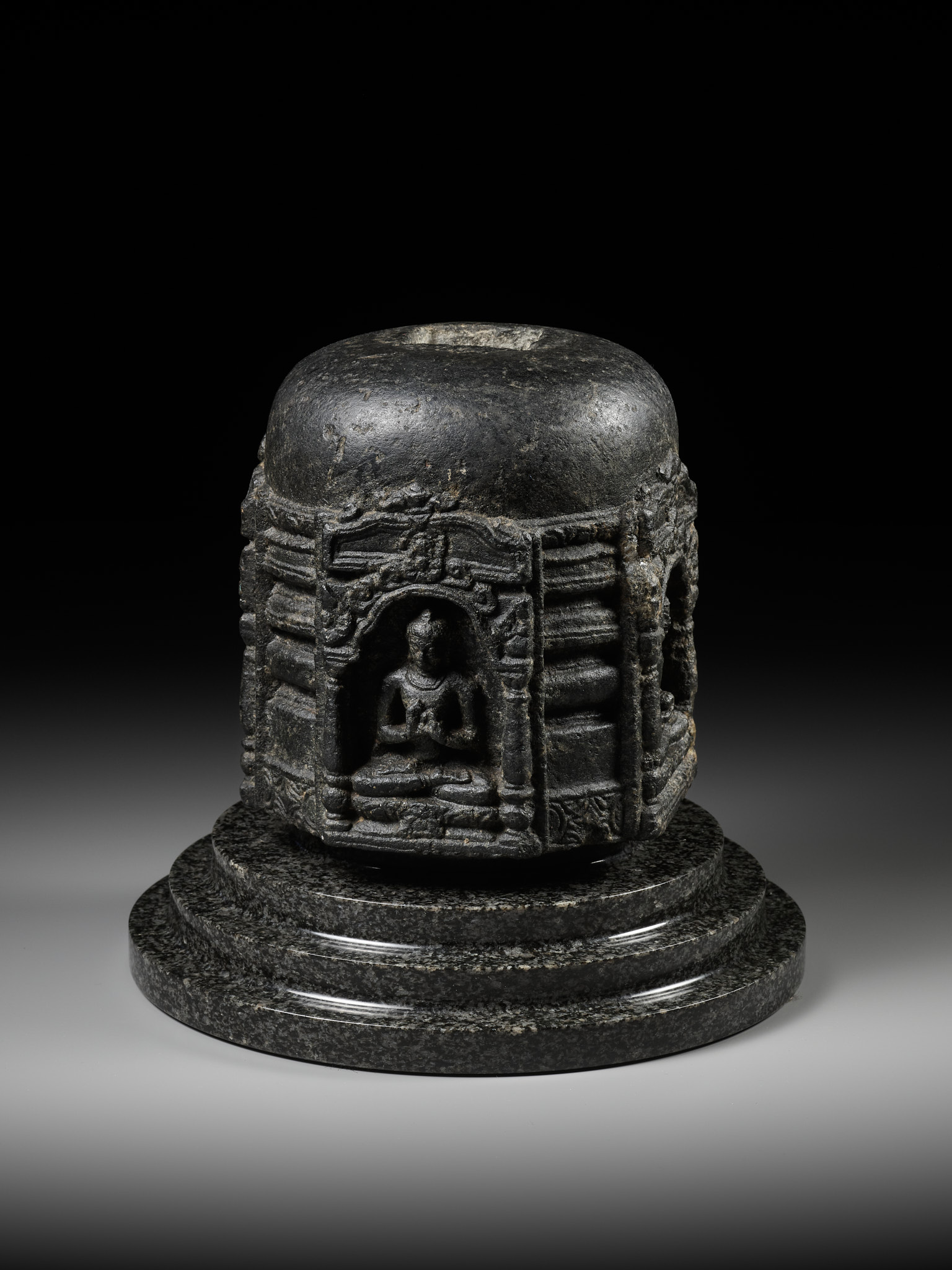 Lot 249 - A BLACK STONE STUPA DRUM WITH FOUR BUDDHAS,