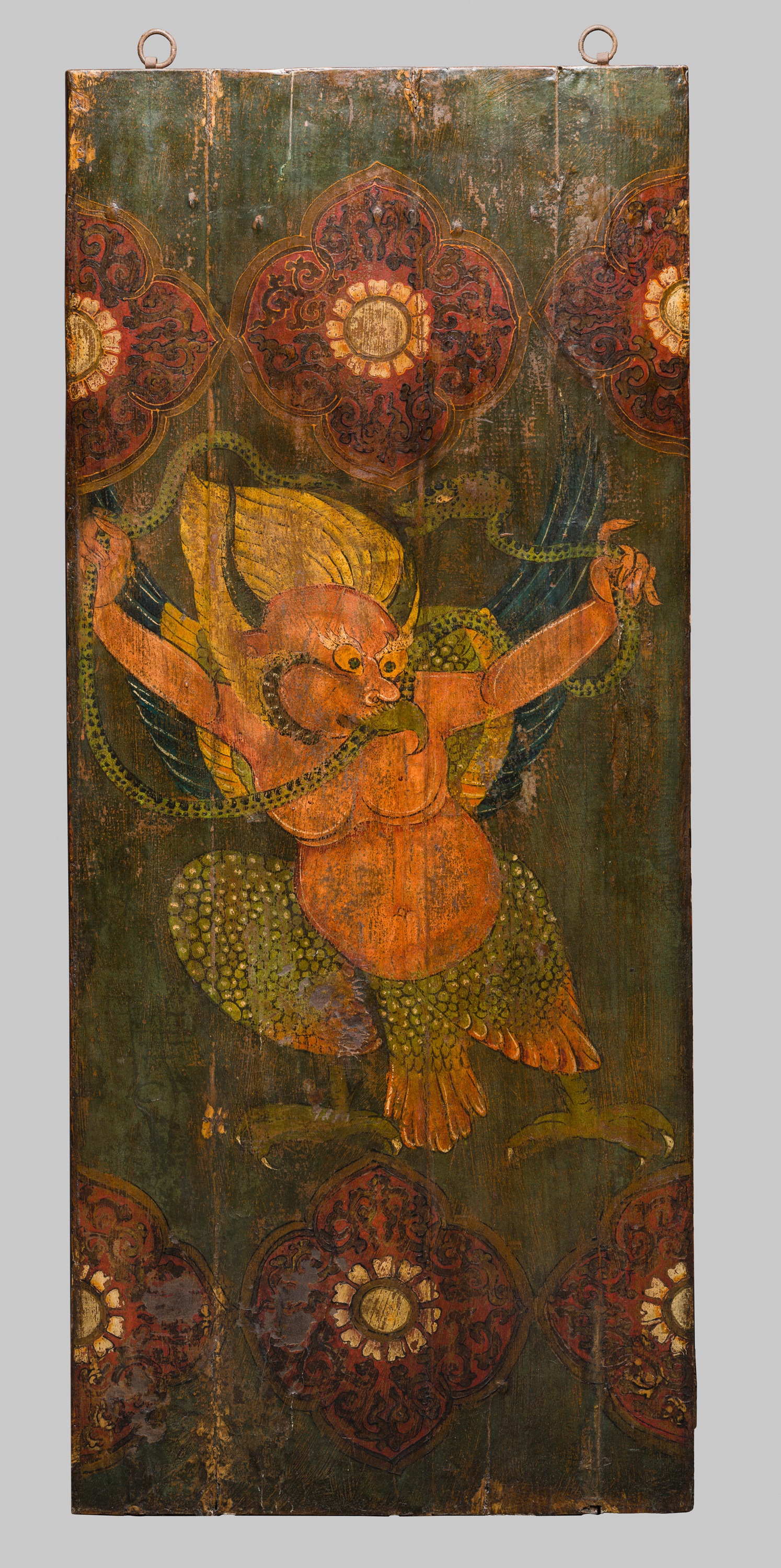 Lot 1490 - A PAINTED WOOD ‘GARUDA’ DOOR, TIBET, 19TH