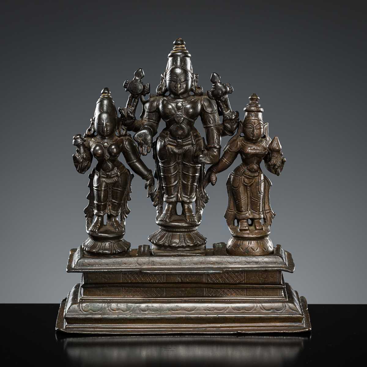 Lot 636 - A BRONZE TRIAD WITH VISHNU, SHRIDEVI, AND