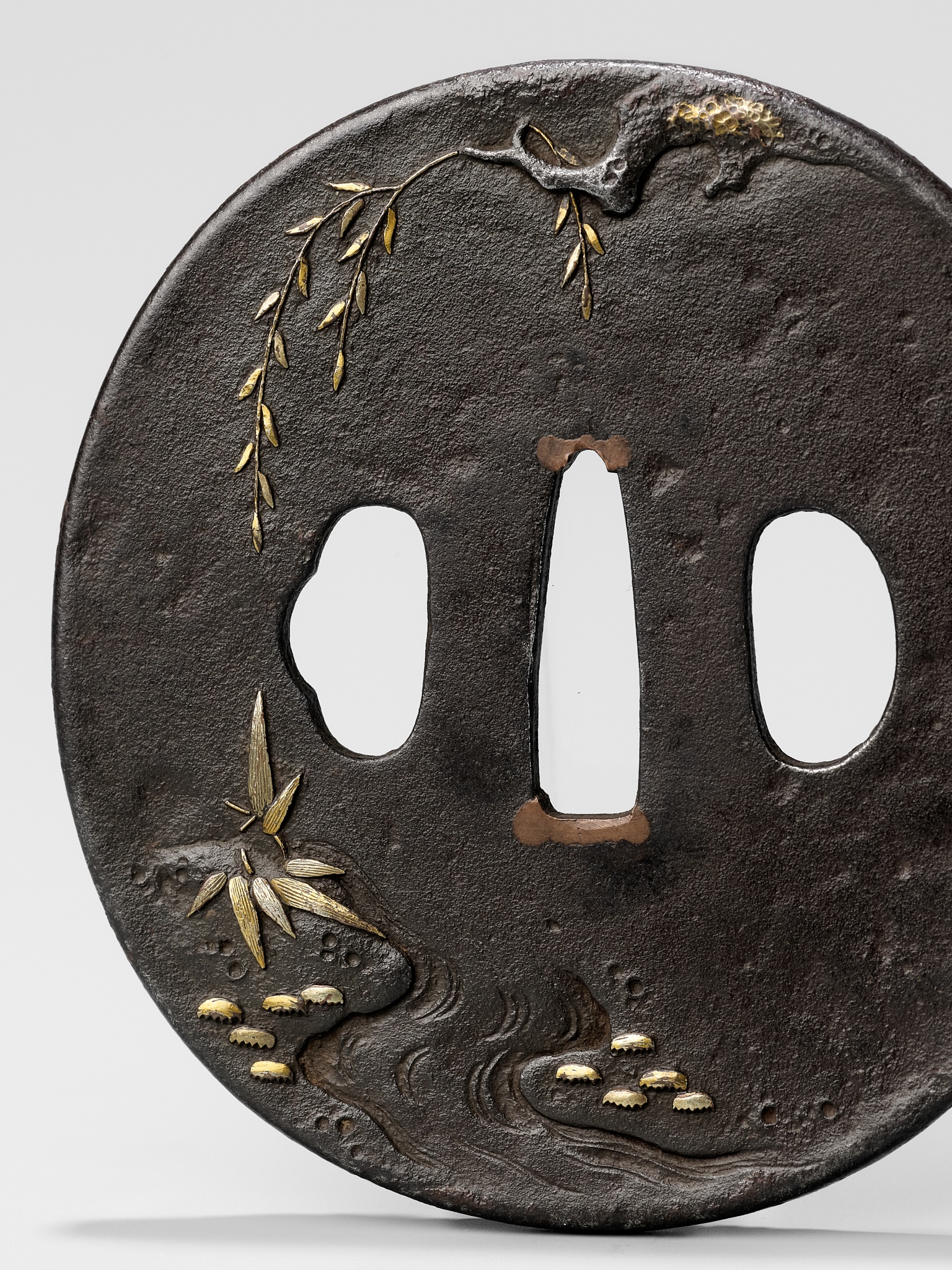 Lot 210 - A RARE IRON TSUBA DEPICTING IEMON AND THE