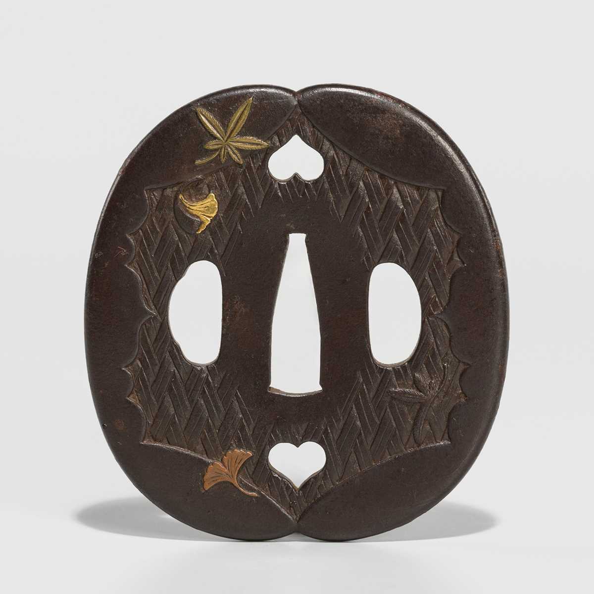 Lot 189 - A RARE IRON SUKASHI TSUBA WITH MAPLE AND