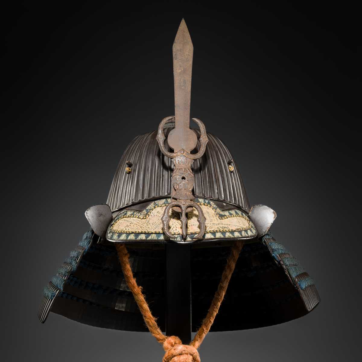 Lot 167 - AN IRON SUJIBACHI KABUTO WITH SUKEN MAEDATE