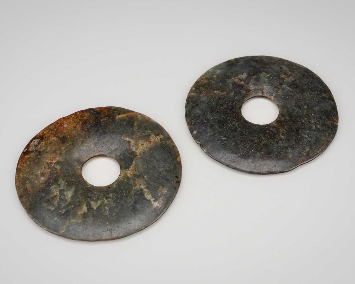Lot 795 - A FINE GROUP OF TWO NEOLITHIC JADE DISCS, BI,