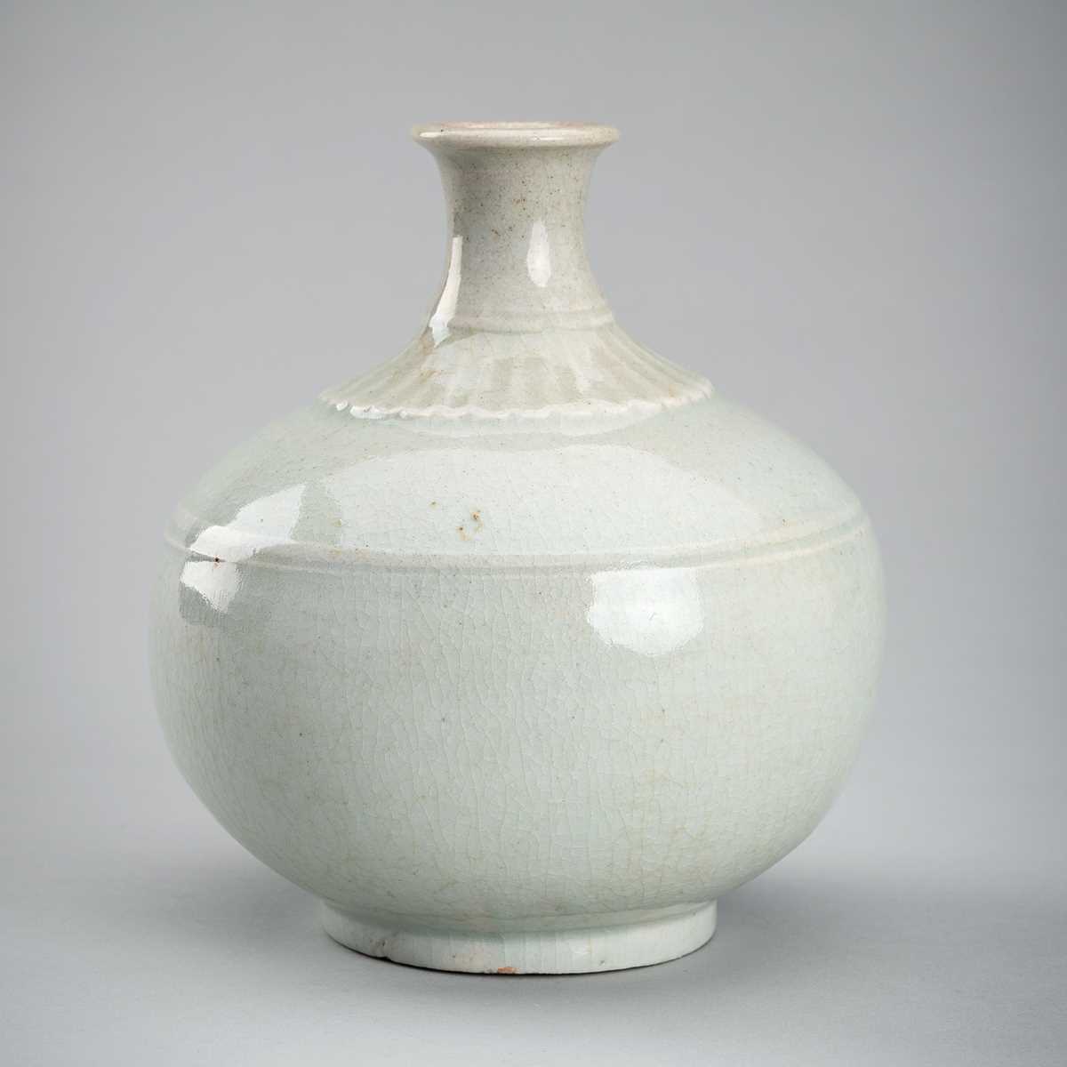 Lot 955 - A PALE CELADON GLAZED PORCELAIN VASE, LATE