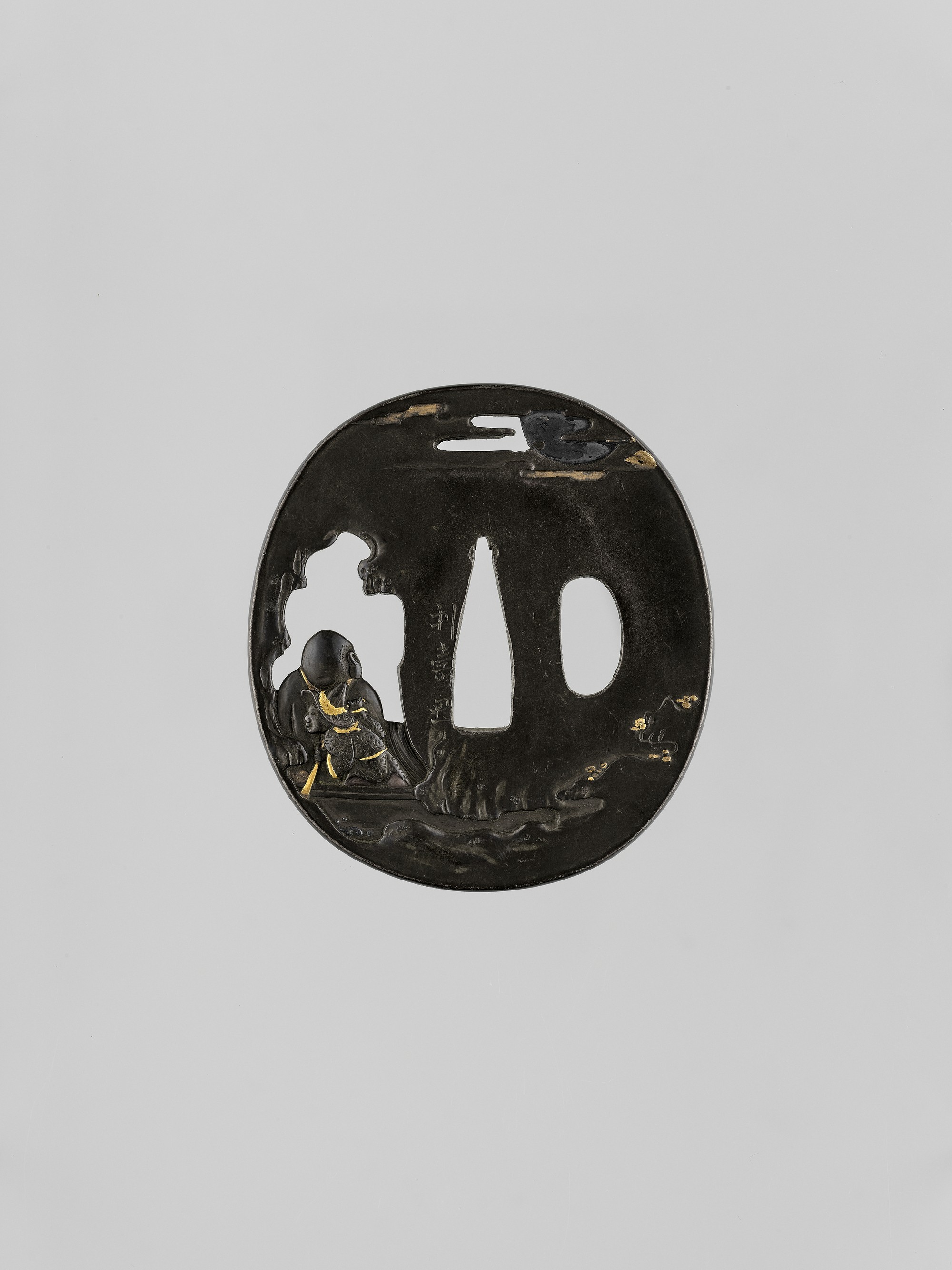 Lot 63 - TOSHIHISA: A SHIBUICHI TSUBA WITH HOTEI AND