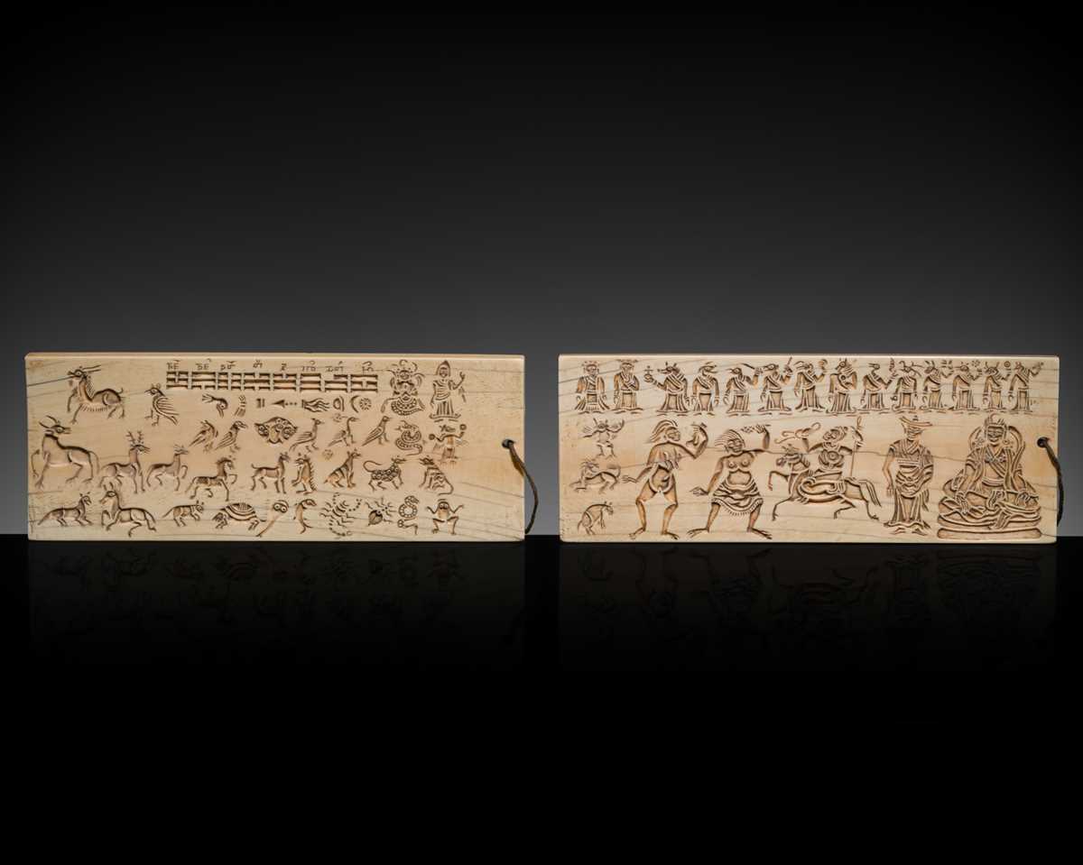 Lot 124 - A RARE PAIR OF IVORY PLAQUES,
