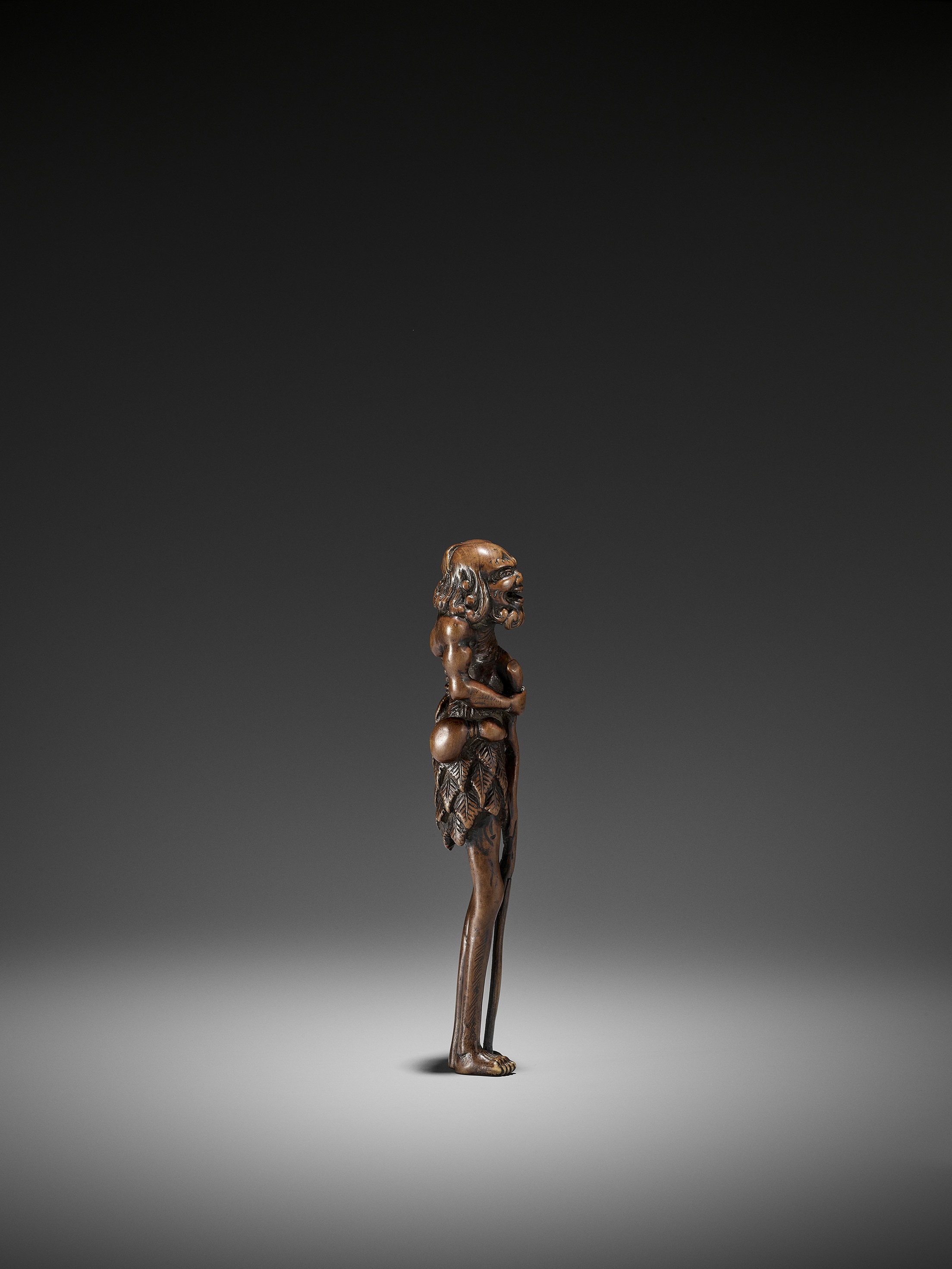 Lot 29 - A SUPERB AND VERY LARGE WOOD NETSUKE OF