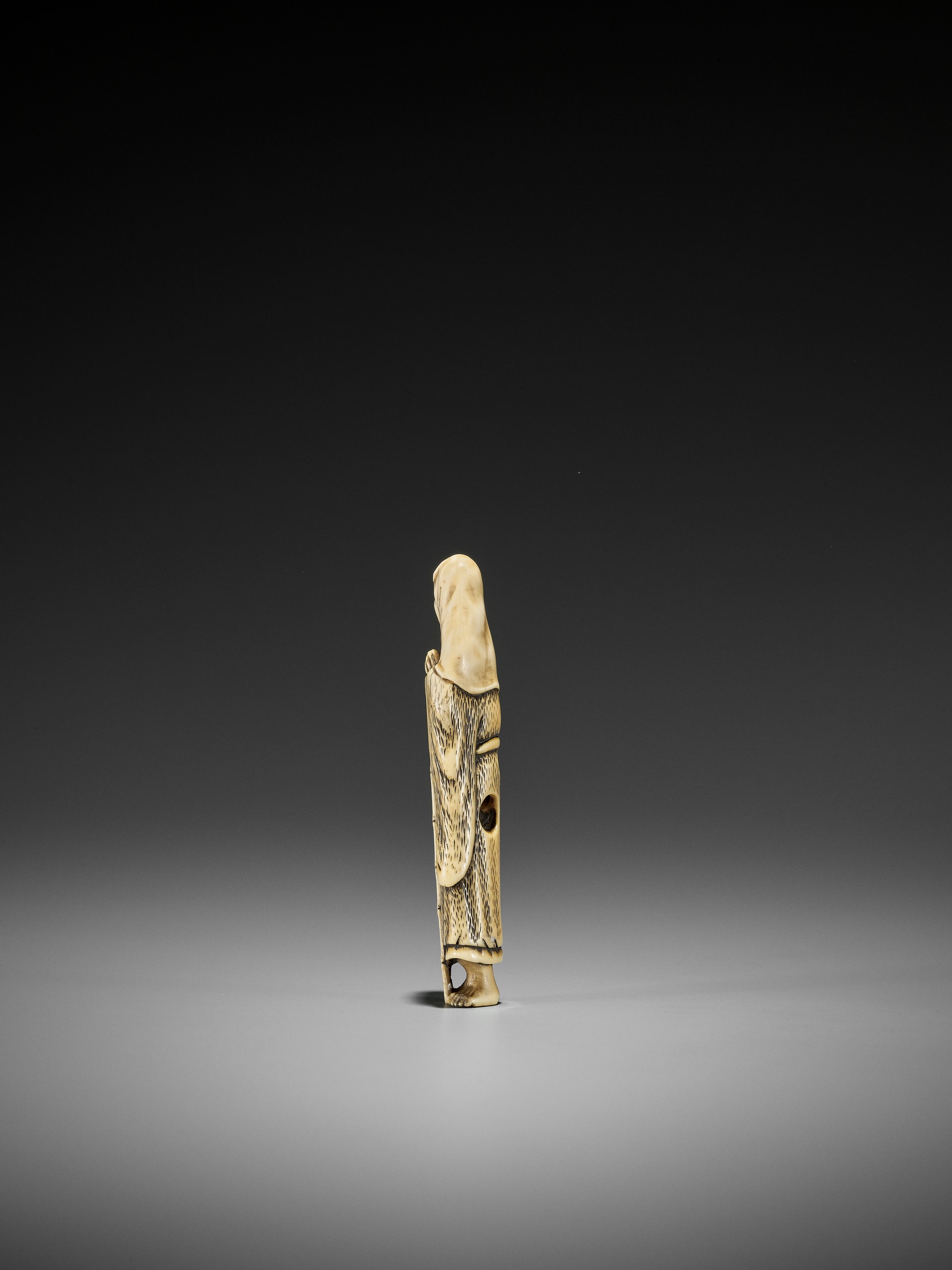 Lot 11 - A VERY RARE IVORY NETSUKE OF A FOX PRIEST